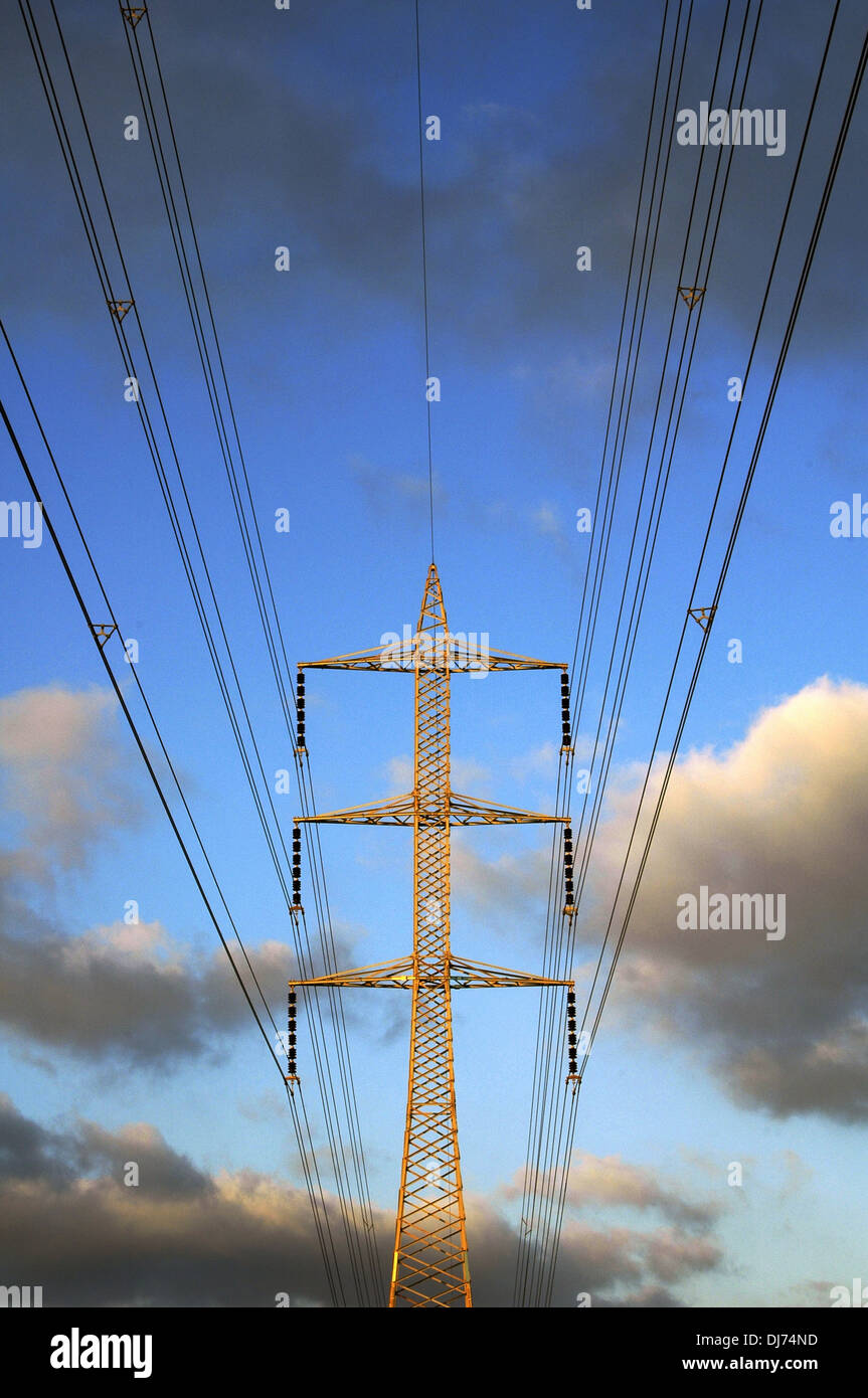 High voltage power transmission lines and electrical pylon Stock Photo ...