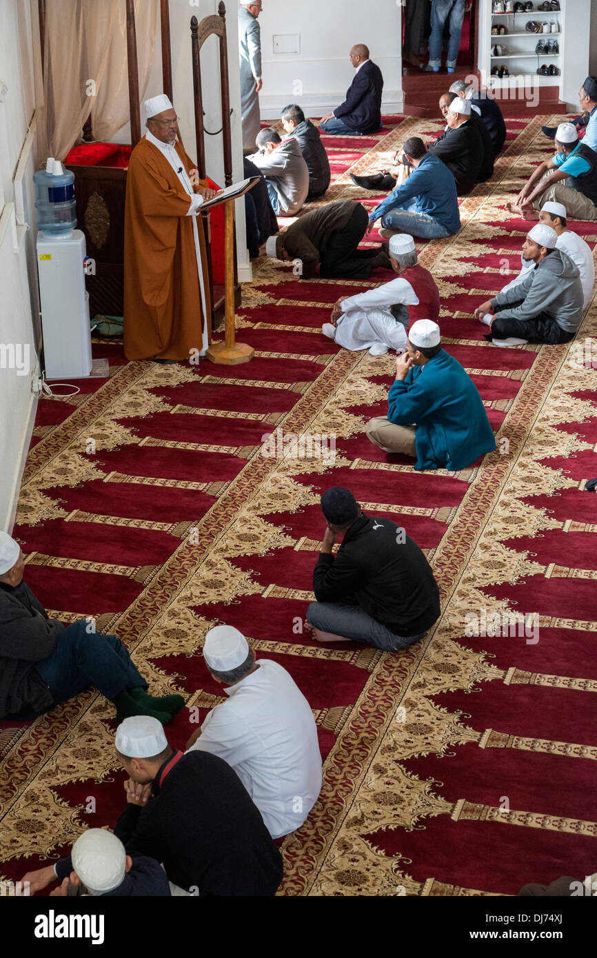 South Africa, Cape Town. A Visiting Imam gives the Friday Sermon before ...