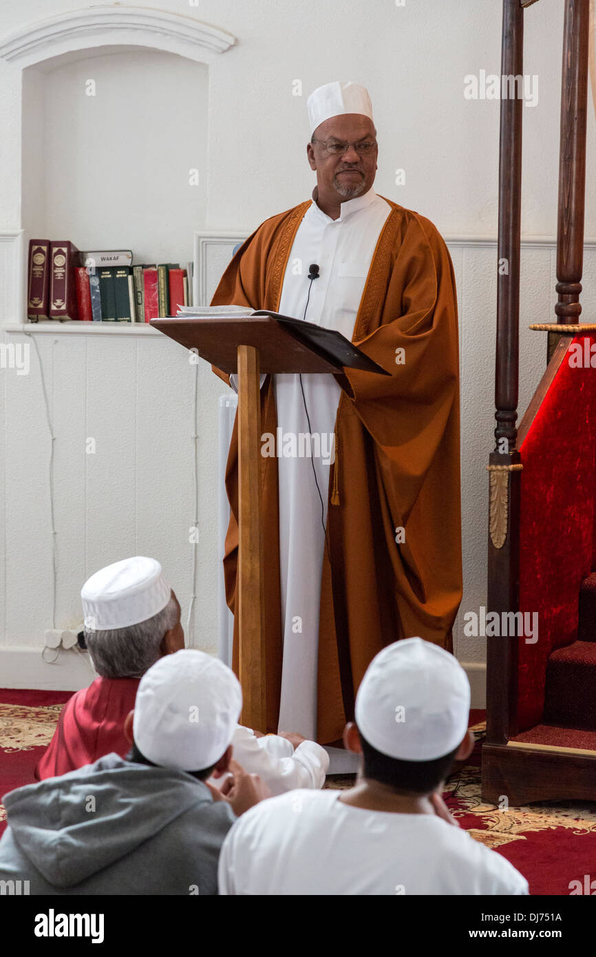 South Africa, Cape Town. A Visiting Imam gives the Friday Sermon before ...