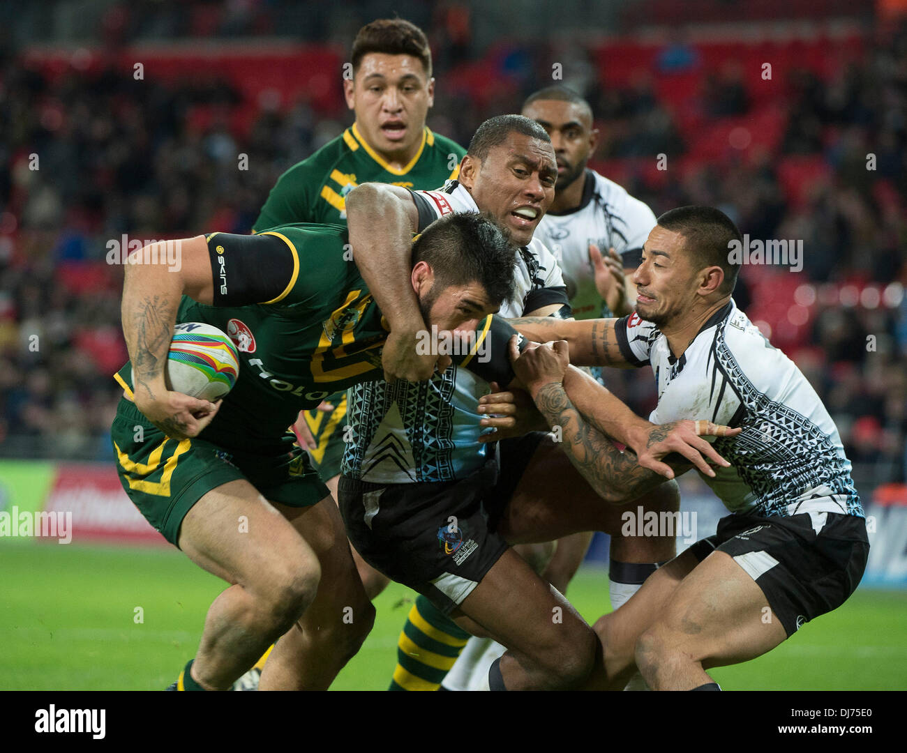 London, UK. 23rd Nov, 2013. Australia's James Tamou [10] goes over for ...