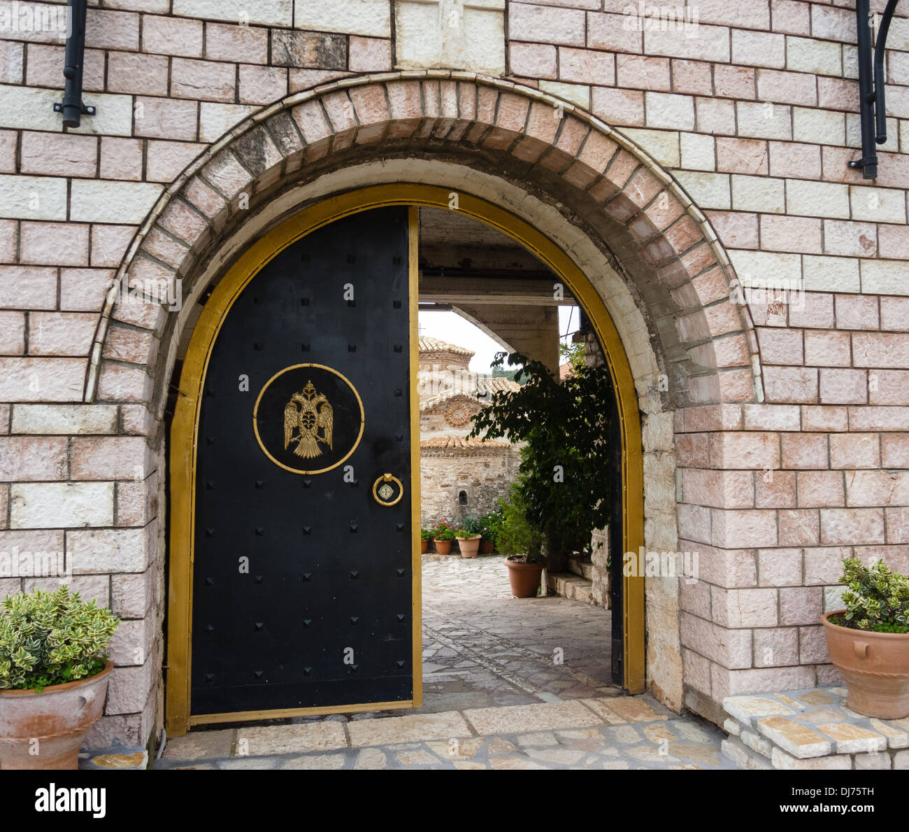 A metal door entrance of a monastery Stock Photo - Alamy