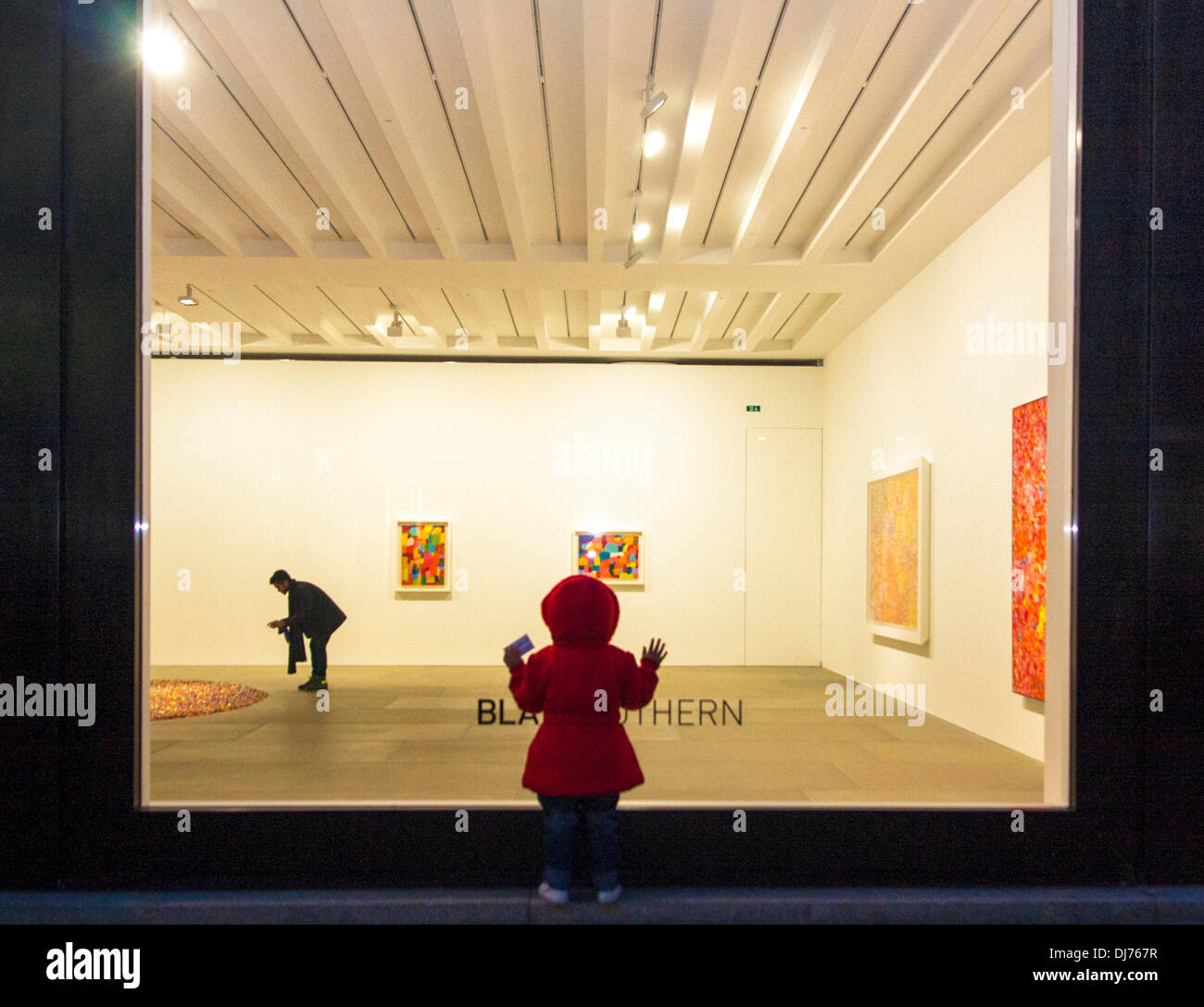 London Hanover Square, London, UK. 23rd Nov, 2013. A child looks at an ...