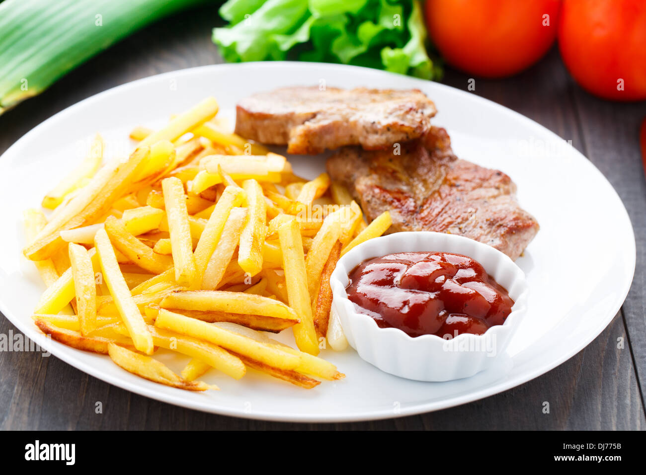 Fried steak with french fries Stock Photo - Alamy