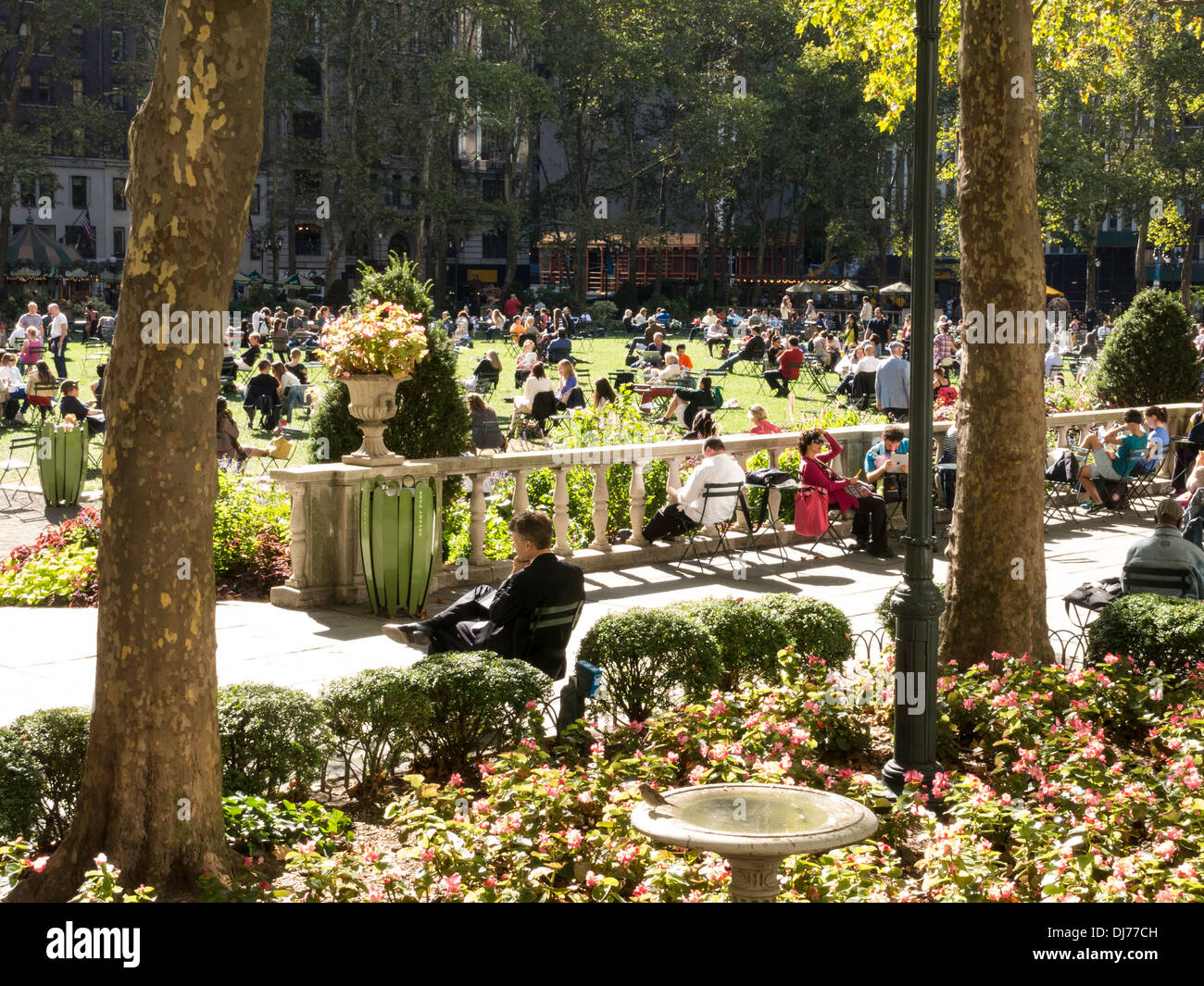 People Enjoying a Fall Day, Bryant Park, NYC Stock Photo - Alamy