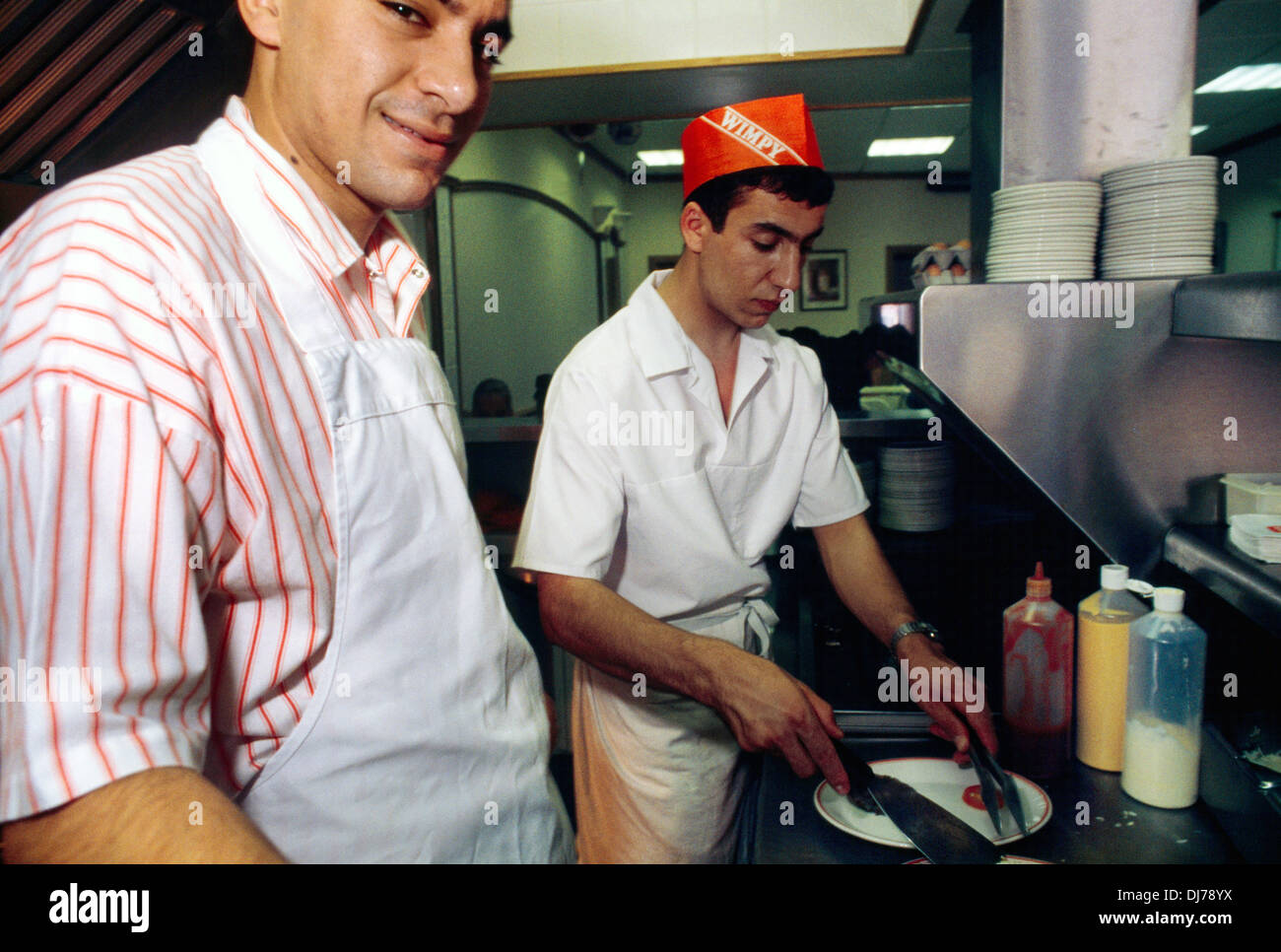 Morden Surrey Wimpy Restaurant Cooks In The Kitchen Stock Photo - Alamy