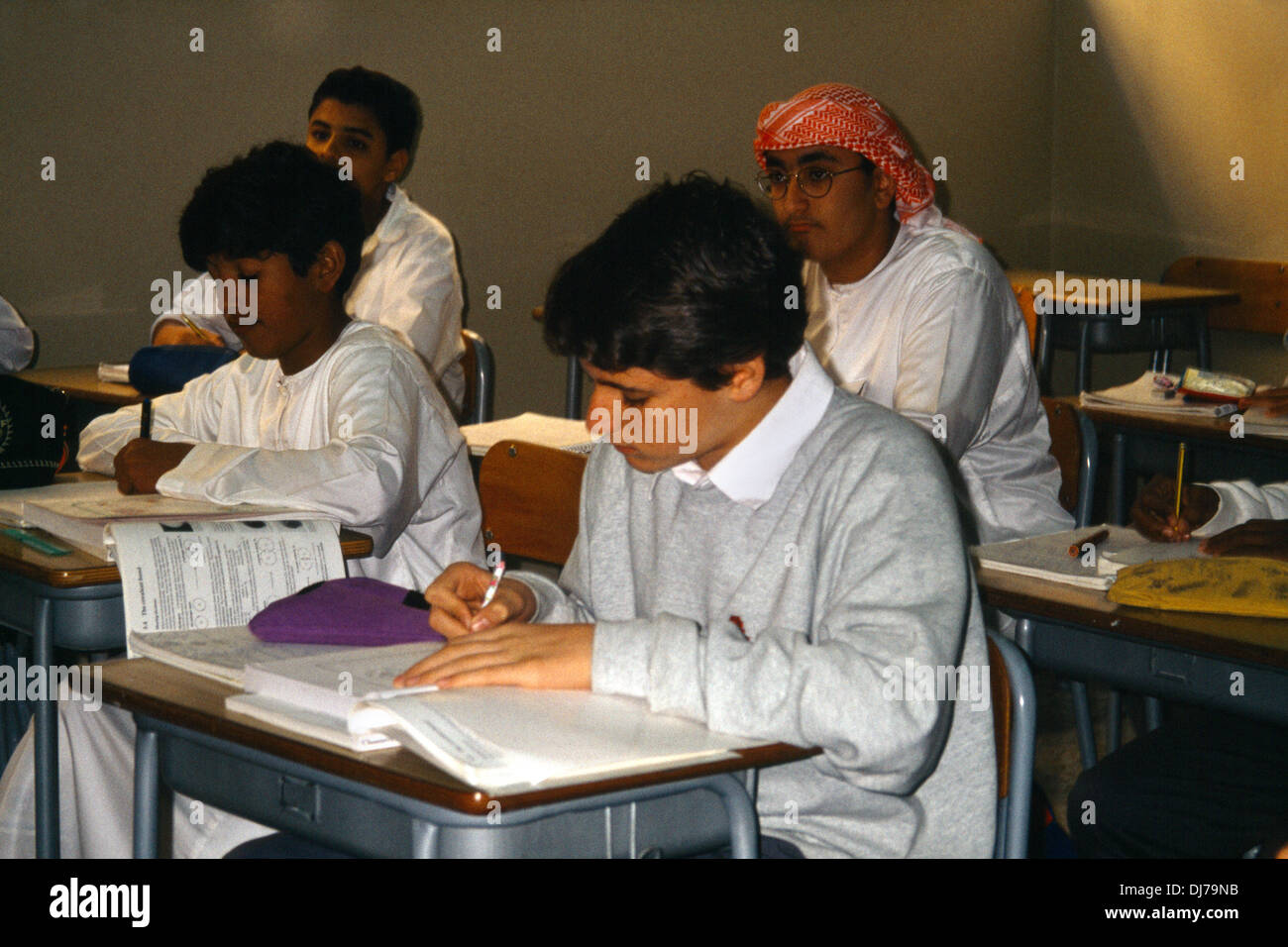 Emirati boy writing hi-res stock photography and images - Alamy
