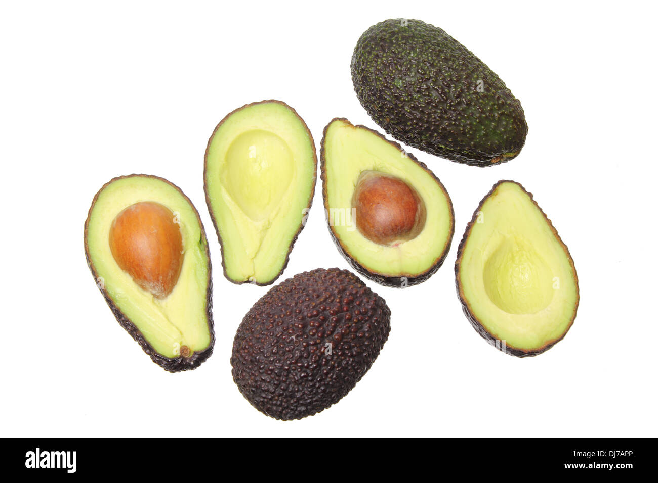 Avocado cut halves seed hi-res stock photography and images - Alamy
