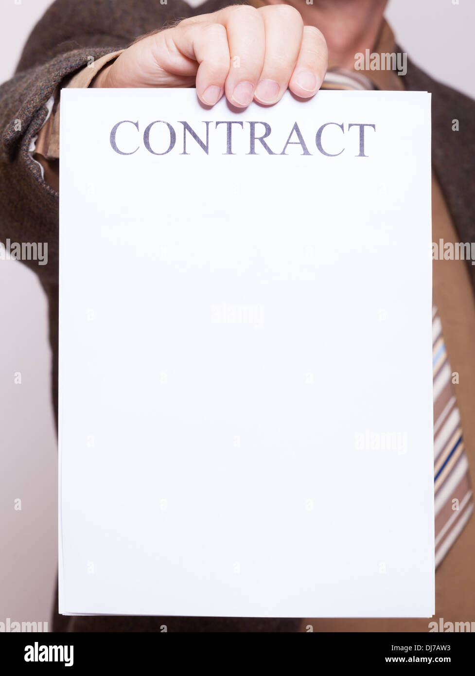 Business concept. Businessman holding blank empty paper sheet with sign ...