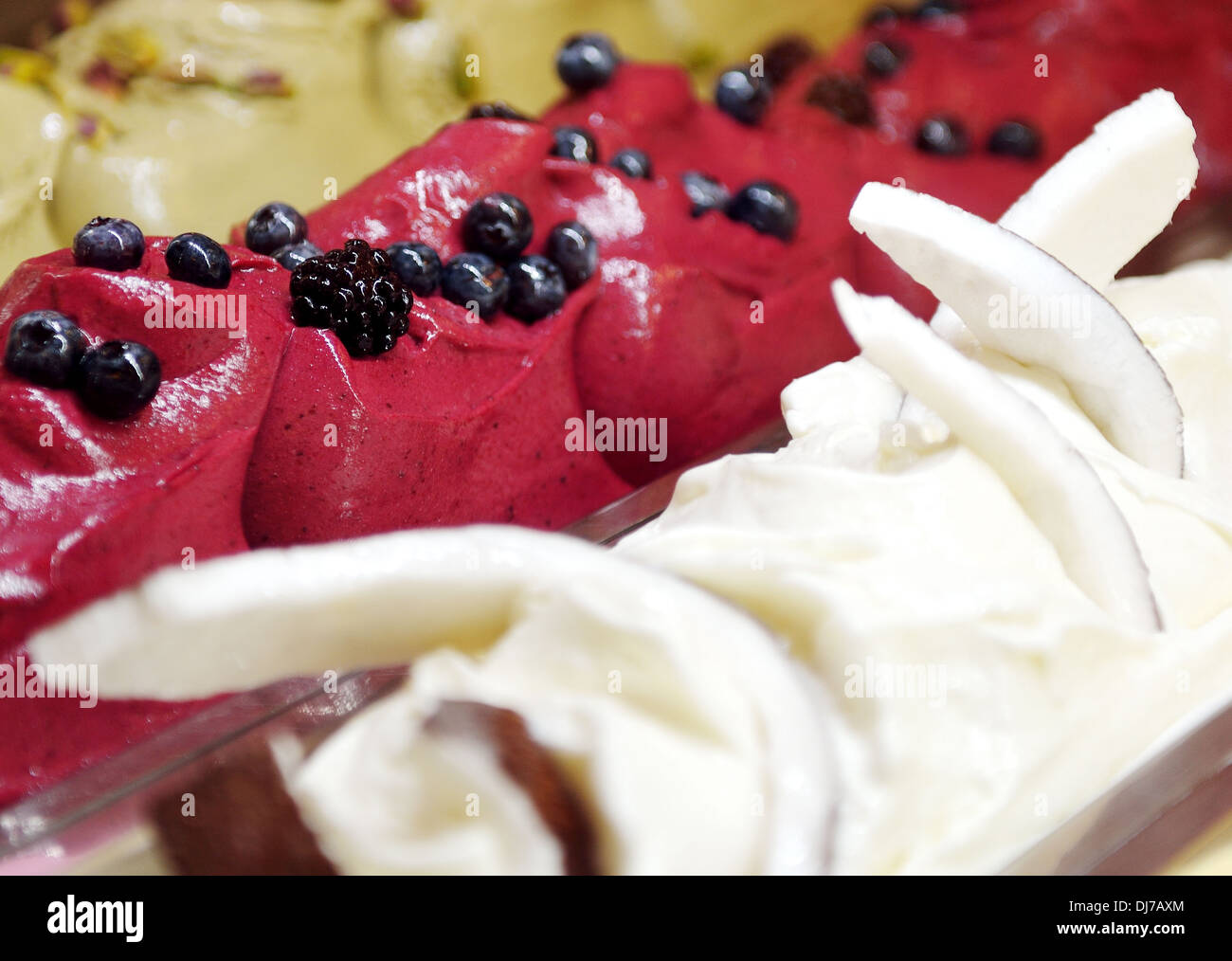 appetizing sweet ice cream with berries and coconut Stock Photo - Alamy