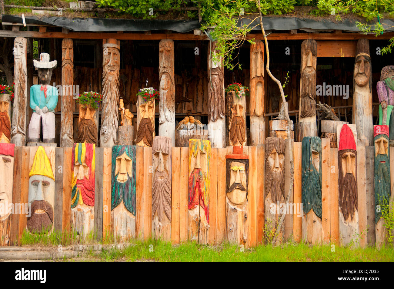 Woodcarver fence, Radium Hot Springs, British Columbia, Canada Stock ...