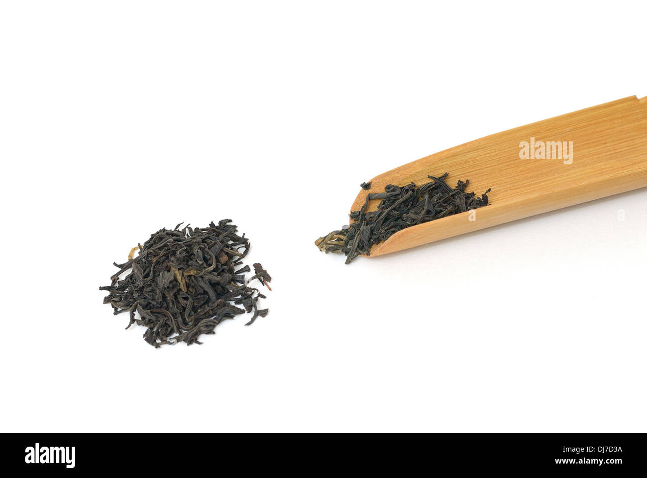 Tea and spoon isolated on white Stock Photo - Alamy