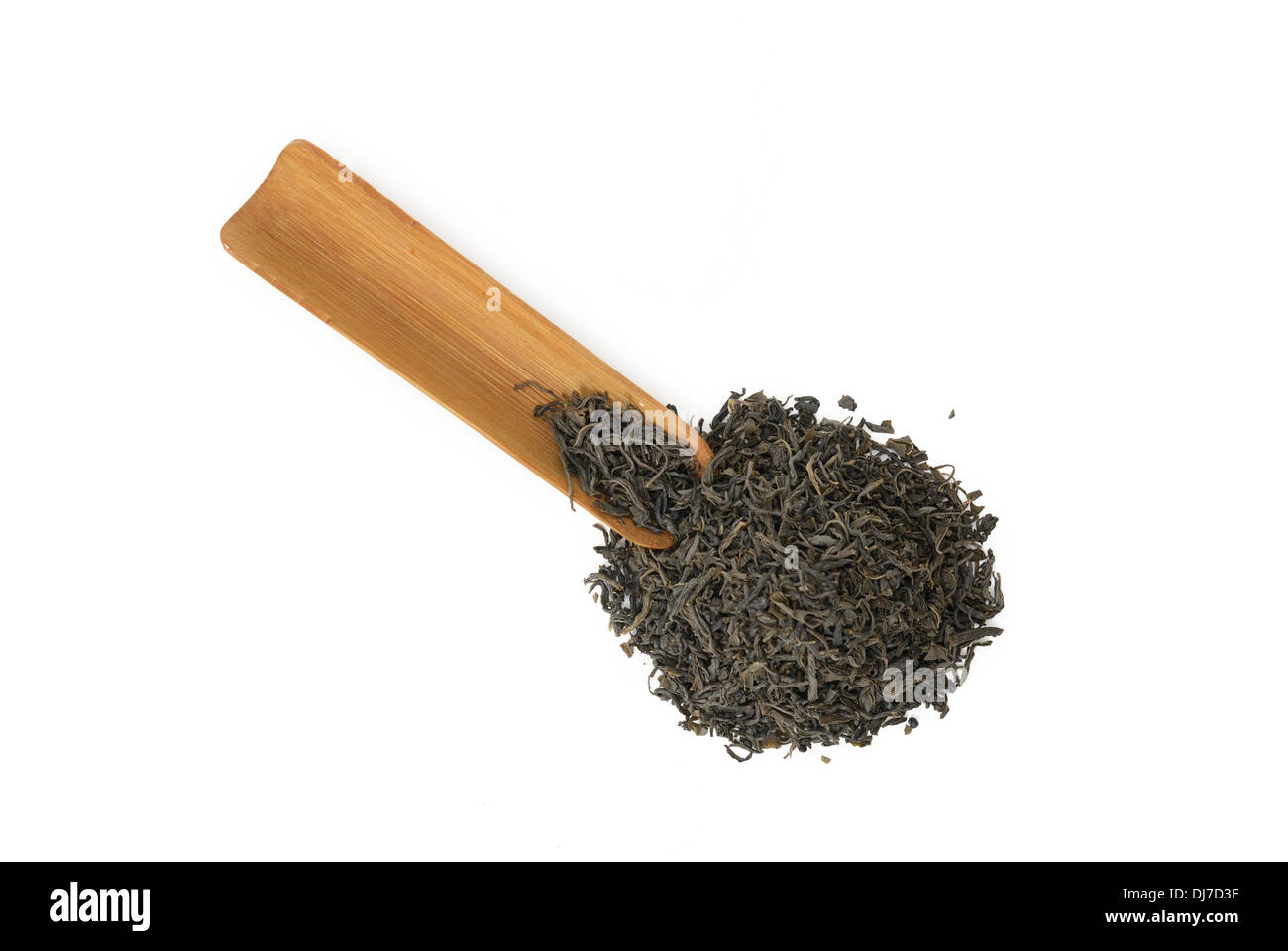 Green tea with wooden spoon, isolated on white Stock Photo - Alamy