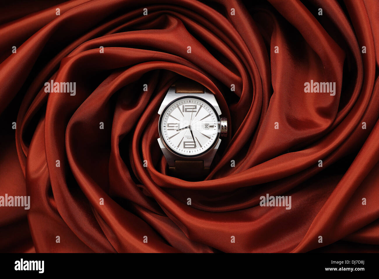 A Wrist Watch on a red Cloth Stock Photo - Alamy