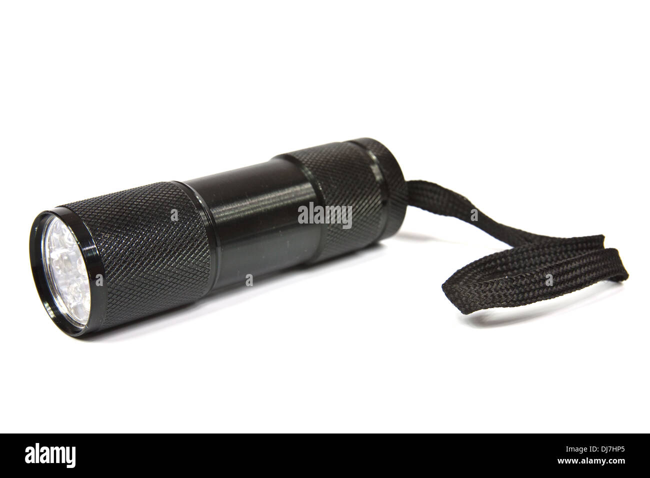 LED flashlight with aluminum body and hand strap on a white background ...