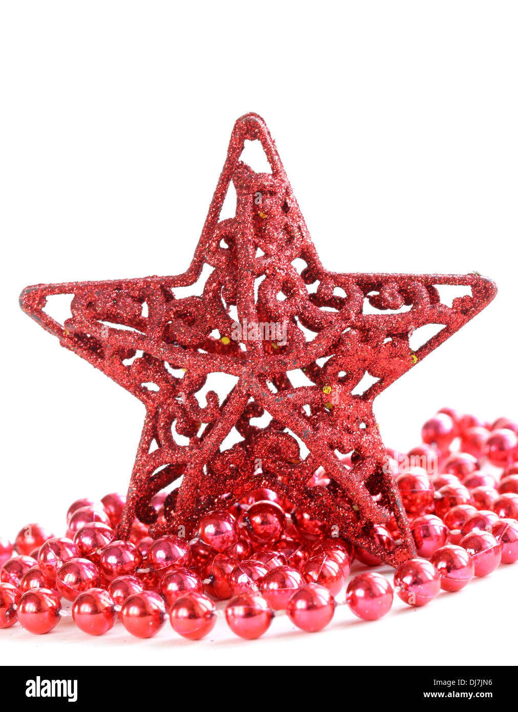 Christmas red star with ribbon on white background Stock Photo - Alamy
