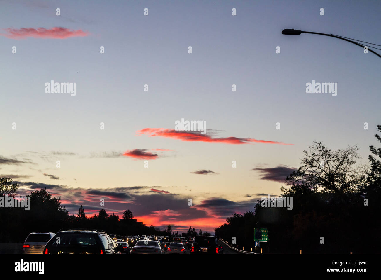 A red sunset on the 101 Freeway near Reseda, Los Angeles California ...
