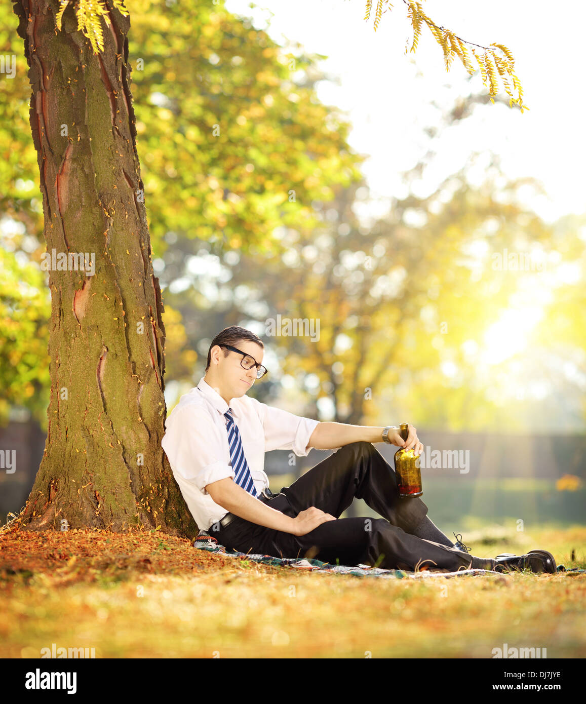 Desperate broke businessman sitting hi-res stock photography and images ...