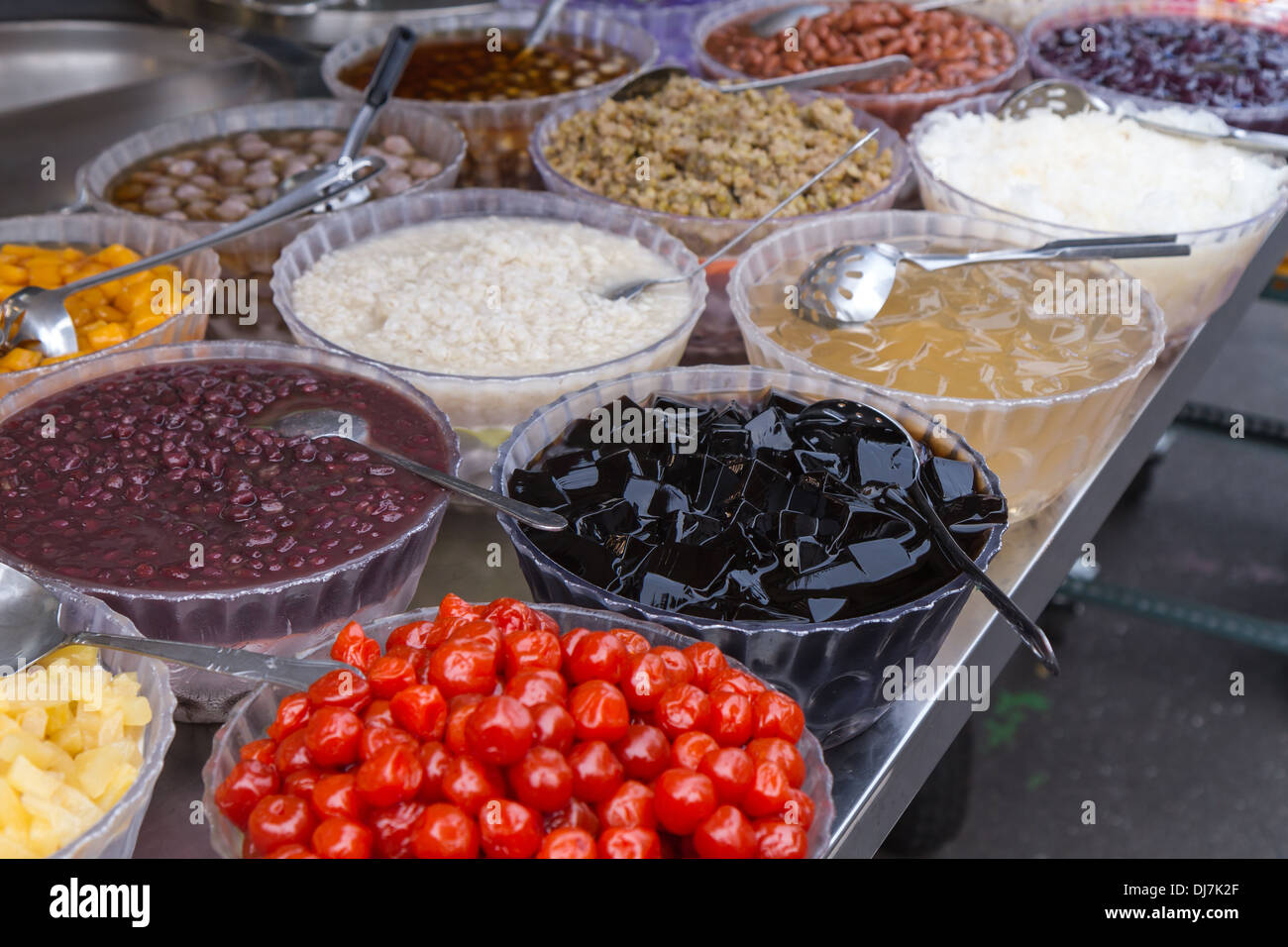 Toppings for Taiwanese shaved ice dessert at a vendor Stock Photo - Alamy