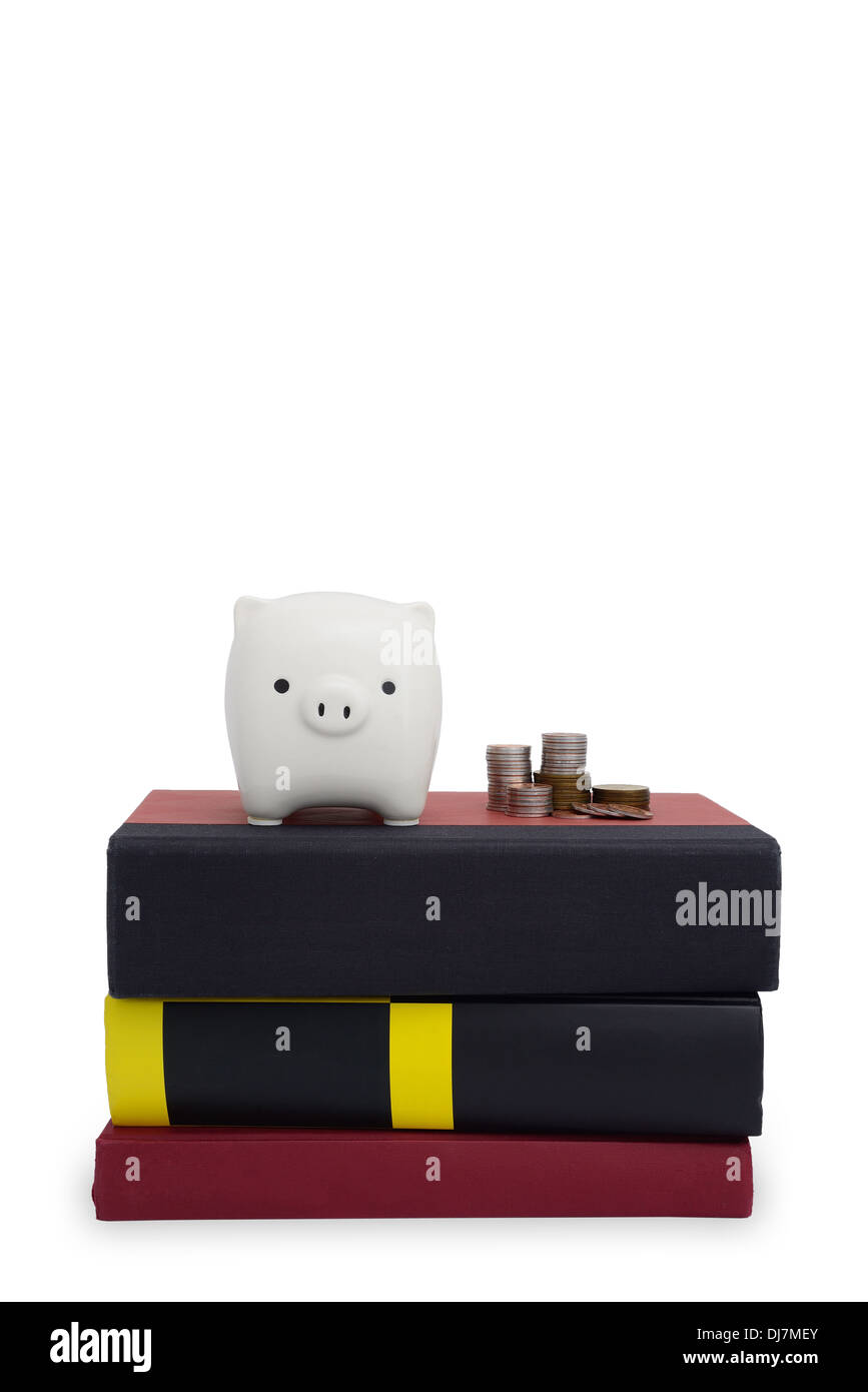 piggy bank on a stack of books Stock Photo - Alamy