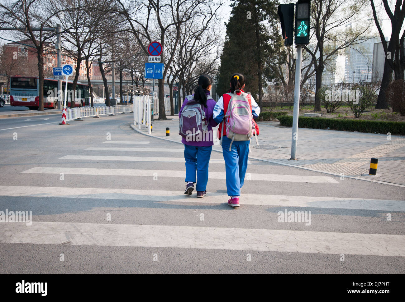 Schoolgirls in uniform walking school hi-res stock photography and ...