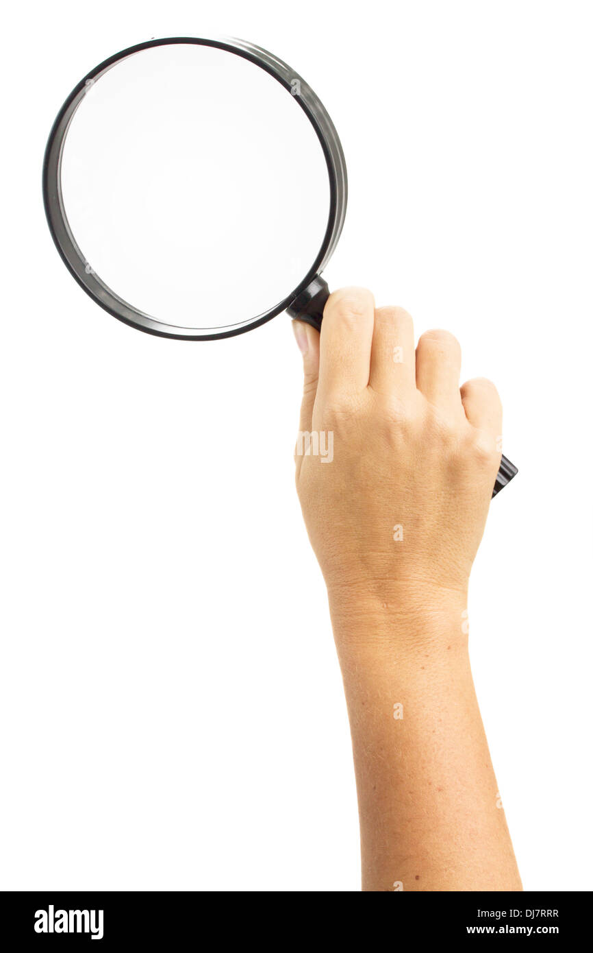 Hand holding a magnifying glass Stock Photo - Alamy