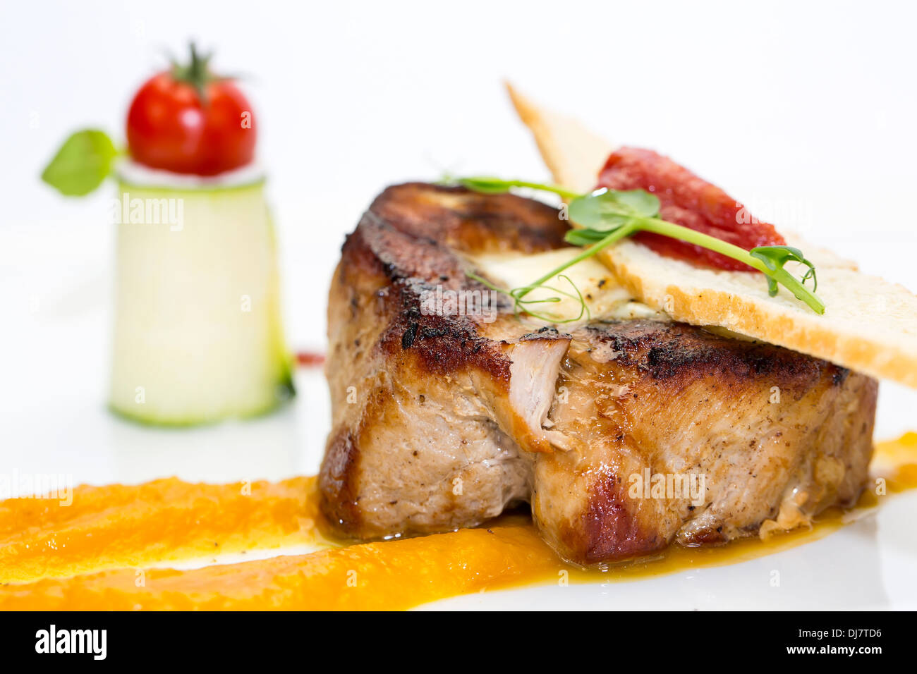 roasted meat with mustard sauce on a white background Stock Photo - Alamy