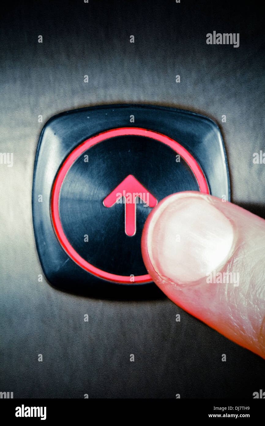 Button outside an elevator or lift Stock Photo - Alamy