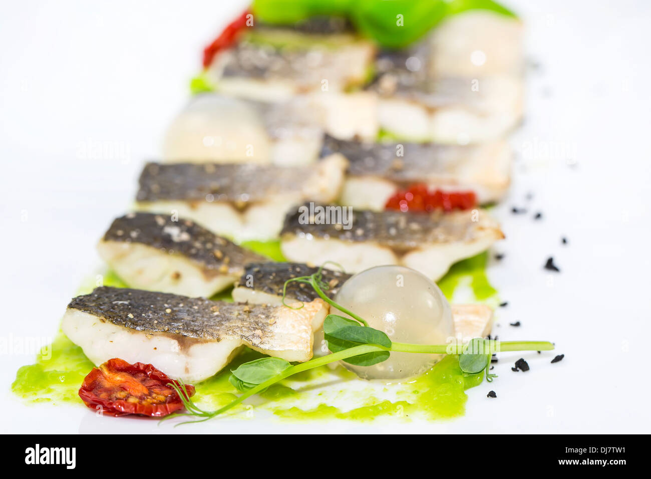 baked black cod fish on a white background in the restaurant Stock ...