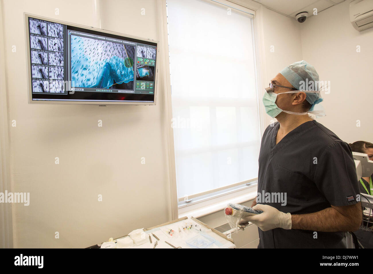 ARTAS robotic hair transplant machine being used at Farjo Hair ...