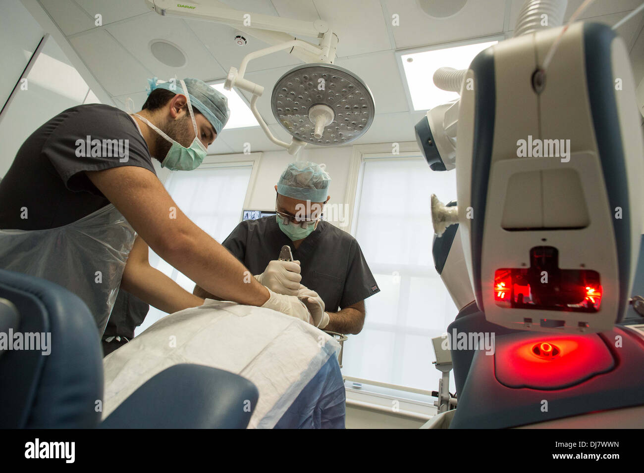 ARTAS robotic hair transplant machine being used at Farjo Hair ...