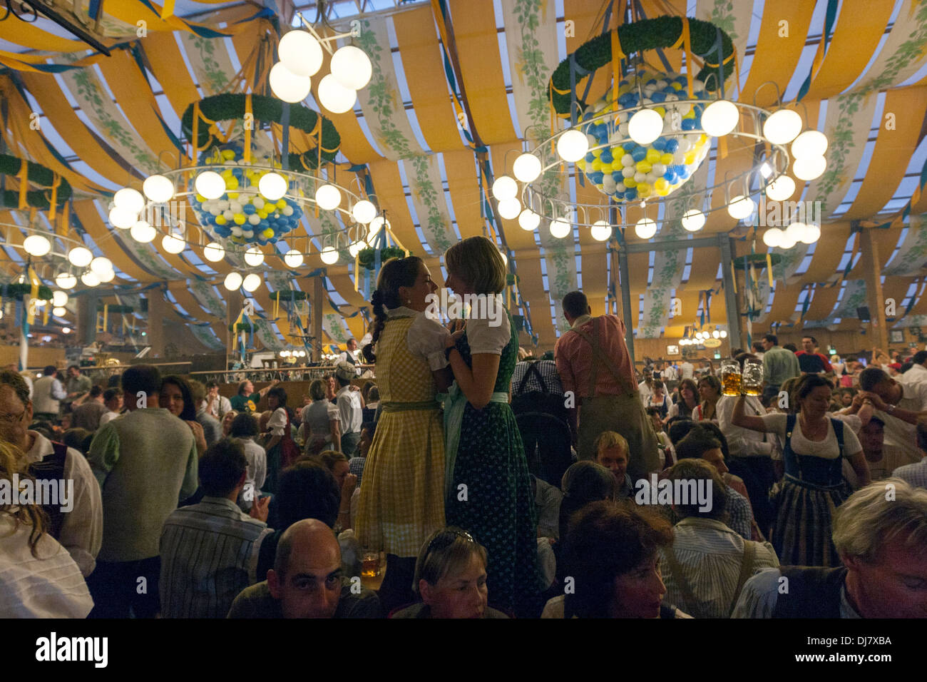 Two girls at beer festival tent, Oktoberfest, Munich, Bavaria, Germany ...