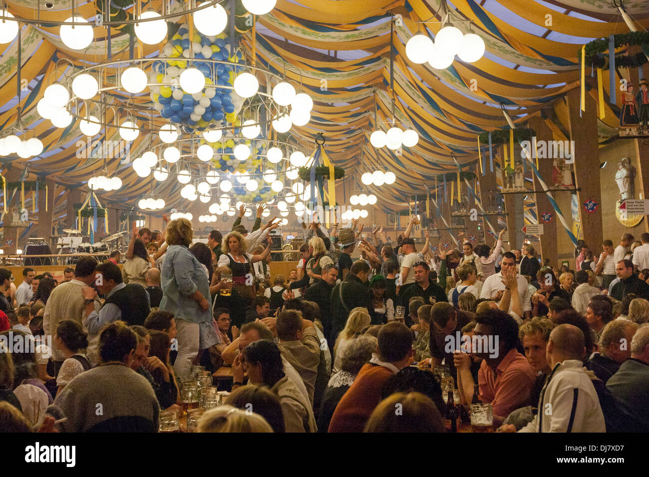 People drinking beer in the Oktoberfest, the world's largest beer ...