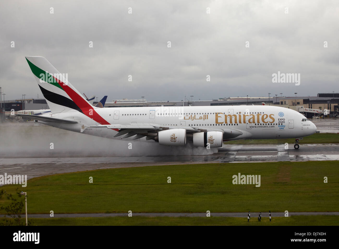 Emirates Airbus A380 landing in bad weather and rain at London Heathrow ...
