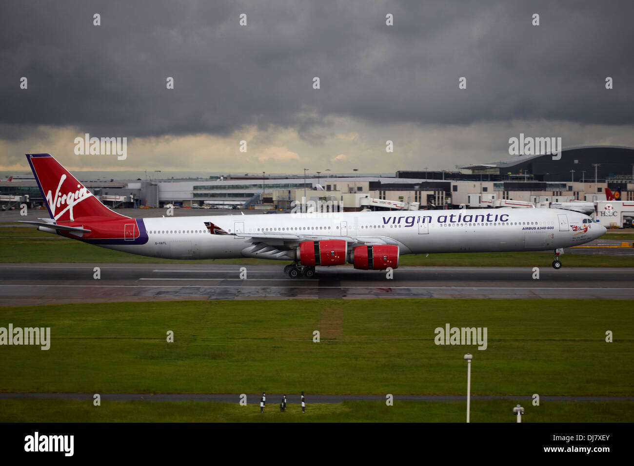 Virgin Atlantic Airbus A340 landing at London Heathrow Airport Stock ...