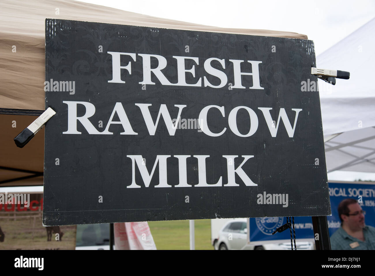 Fresh raw cow's milk for sale sign Stock Photo - Alamy