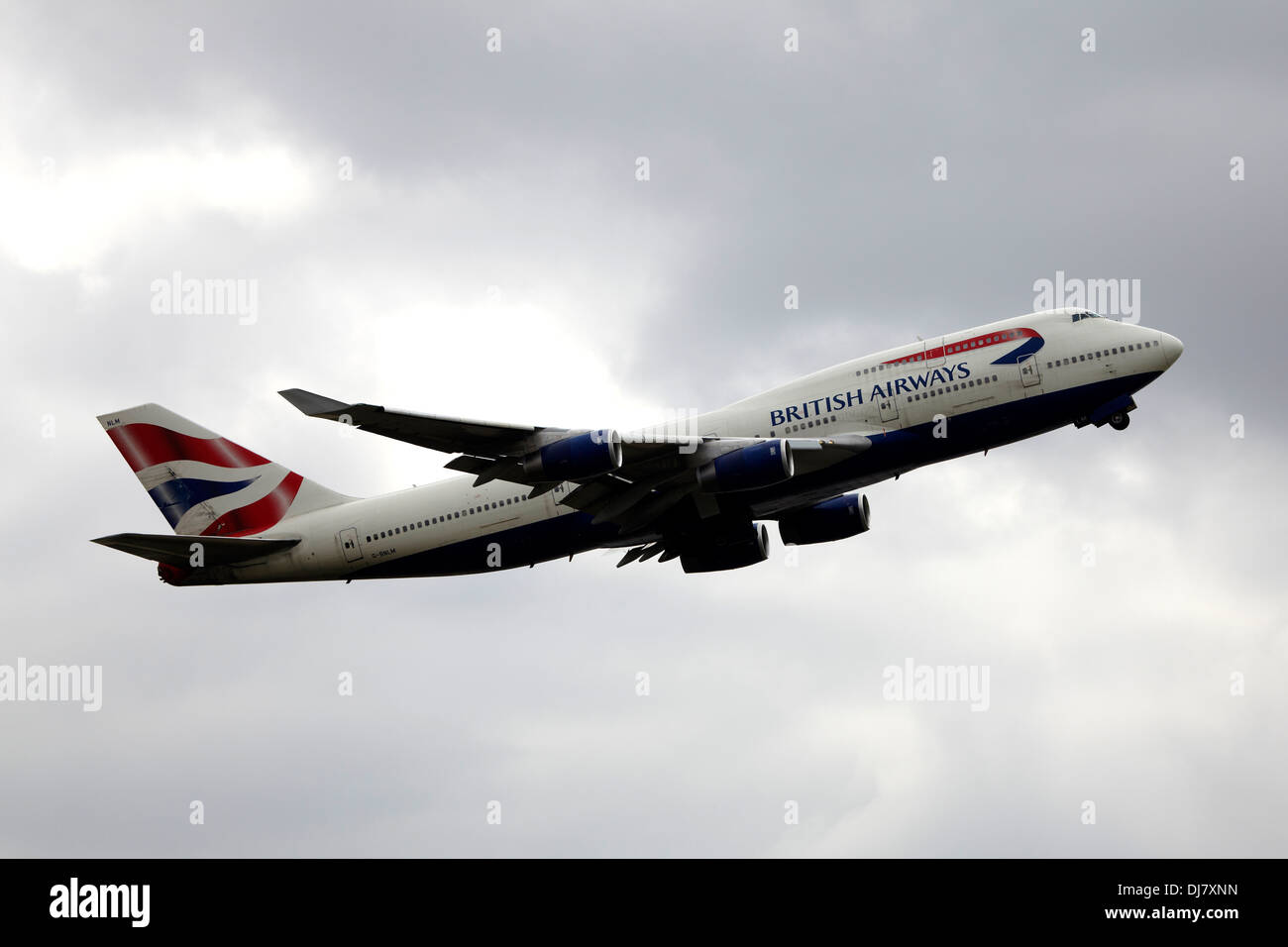 British Airways Boeing 747 taking off in grey cloudy weather at London ...