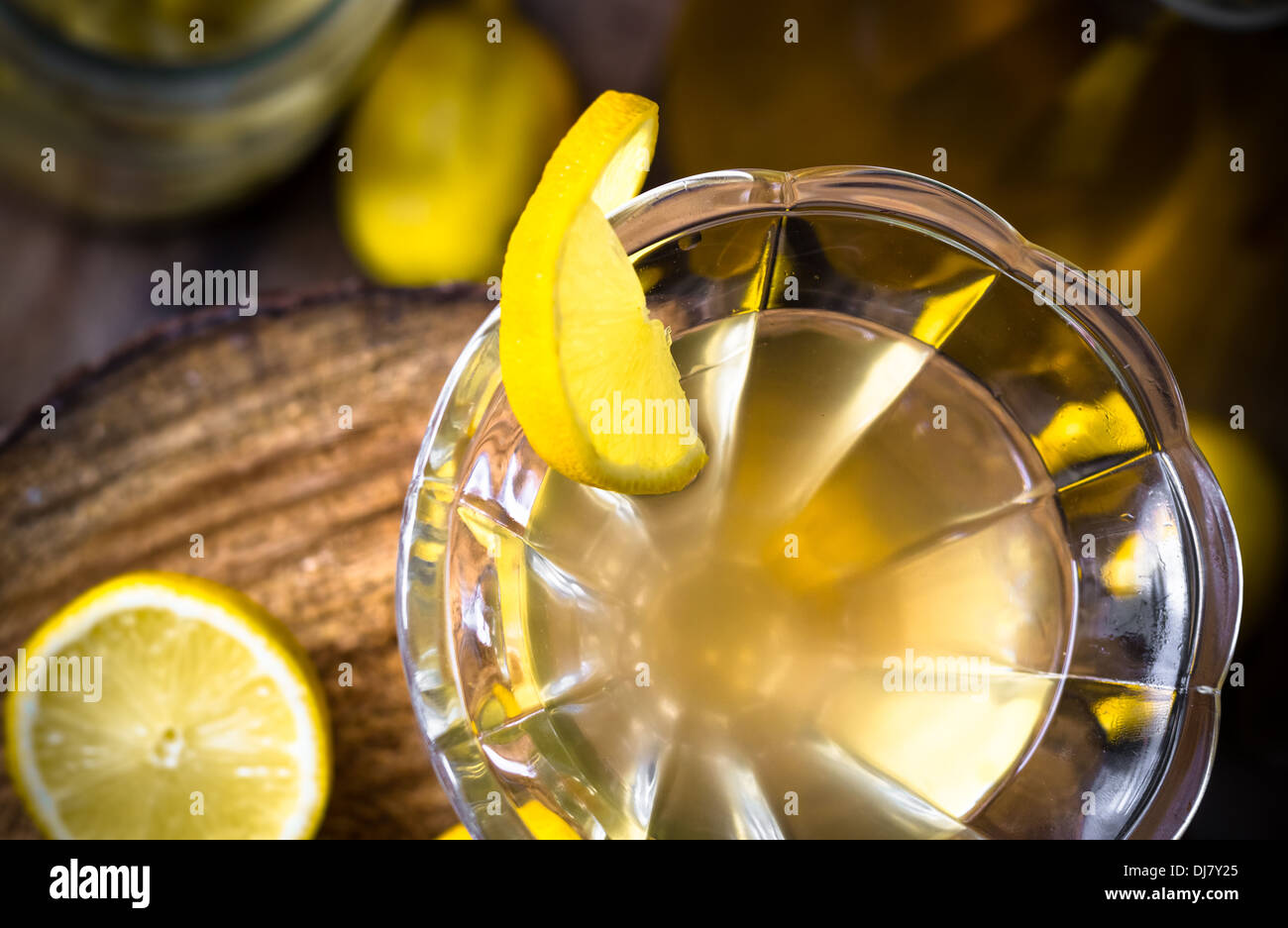 Tincture of quince cups. Fruits in a jar on wooden background Stock ...