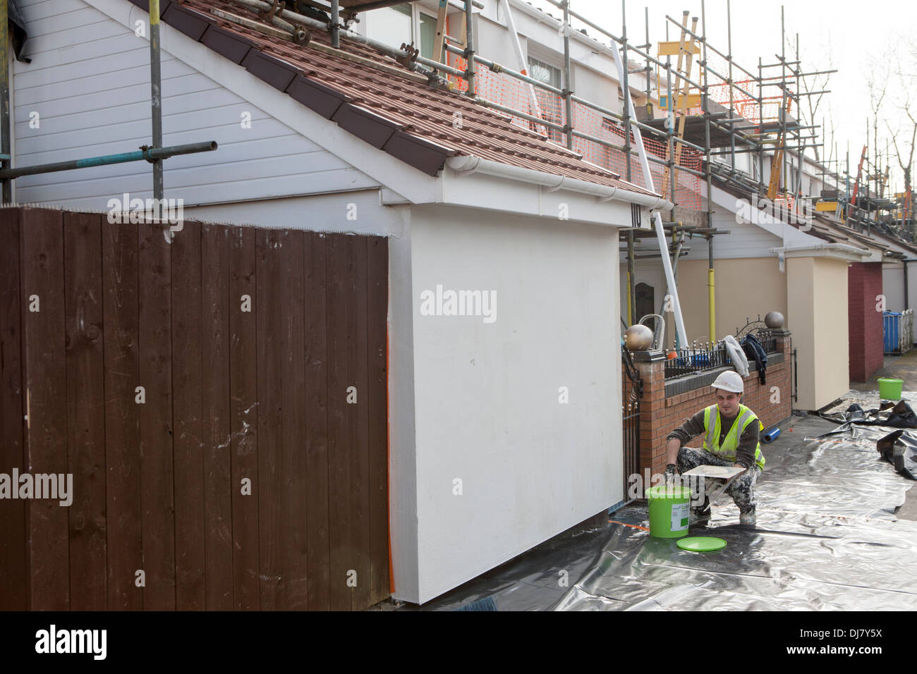 An external wall insulation system EWI being installed as part of the ...