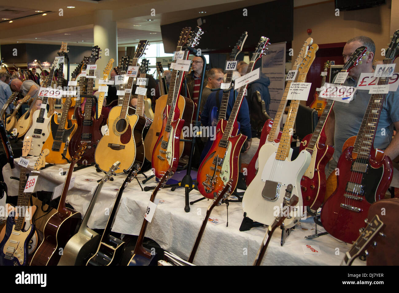 Guitars on the sale floor at the Merseyside Guitar Show, Aintree. One ...