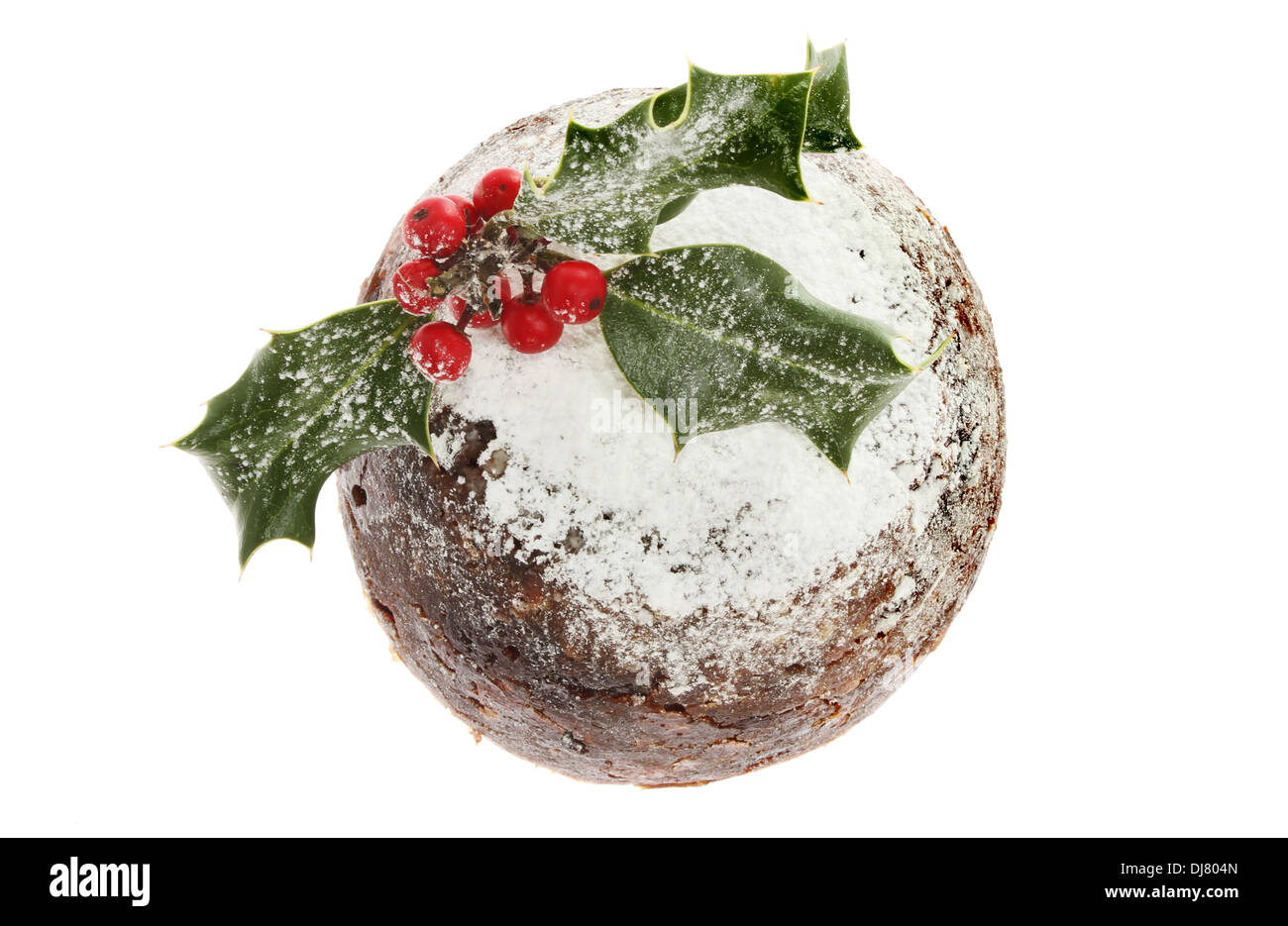 Holly decorated Christmas pudding viewed from above Stock Photo - Alamy