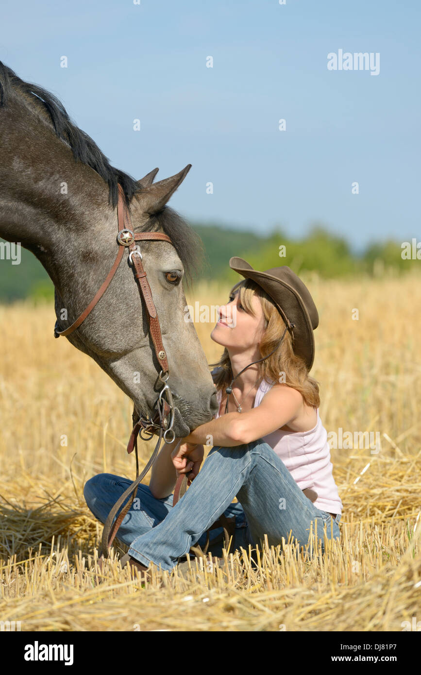 Pony sitting hi-res stock photography and images - Alamy