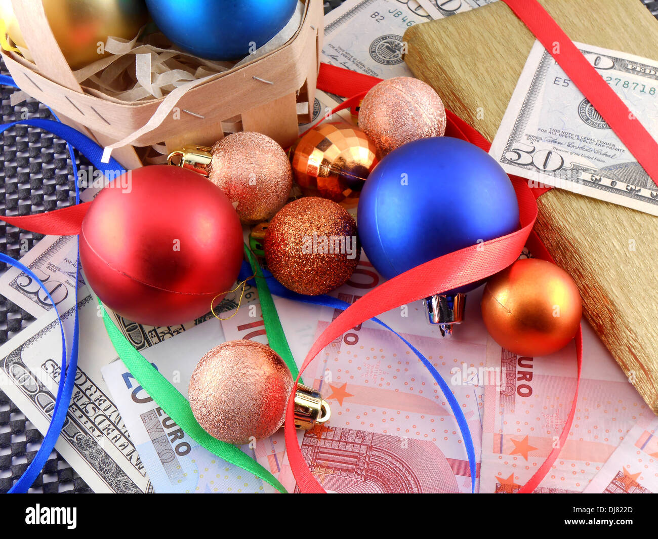 Christmas gift box with christmas balls and money Stock Photo - Alamy