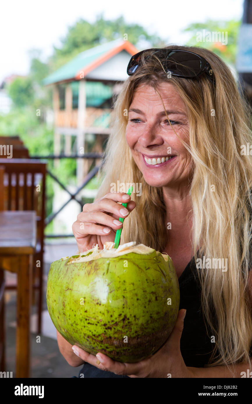 Coconut water drink woman hi-res stock photography and images - Alamy