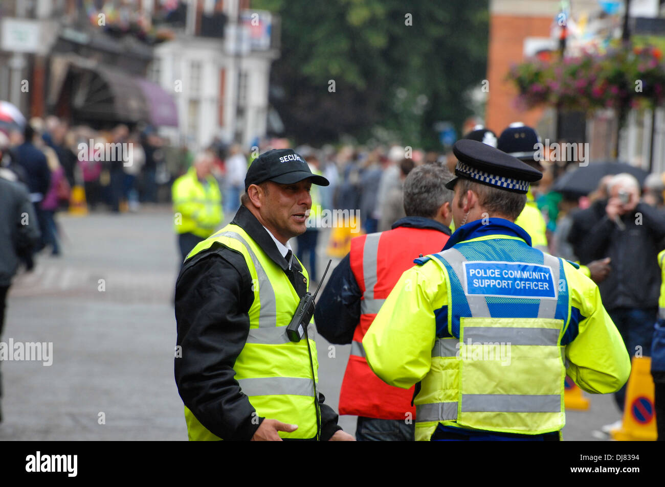 Event security talking to Northamptonshire police Stock Photo - Alamy