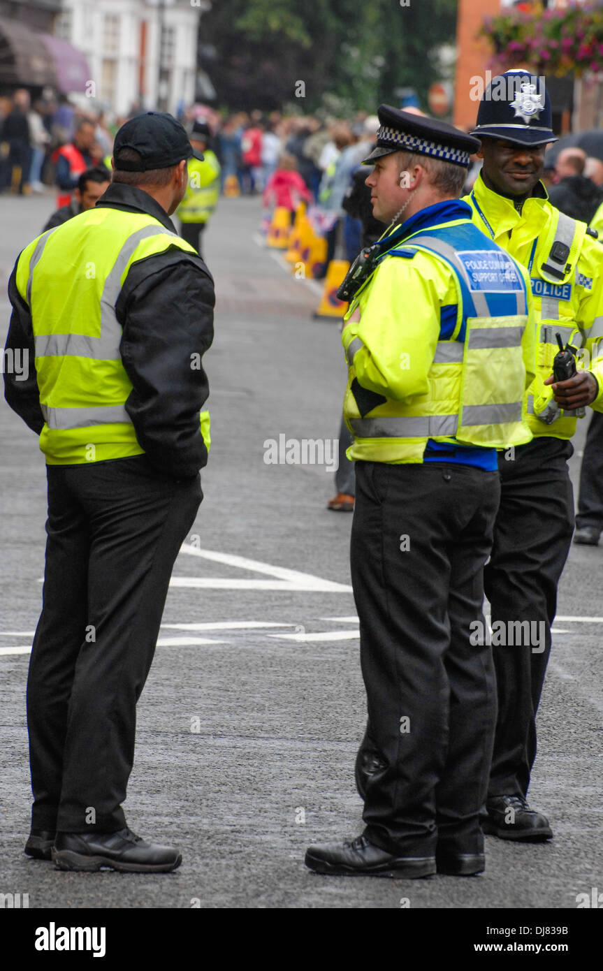 Event security talking to Northamptonshire police Stock Photo - Alamy