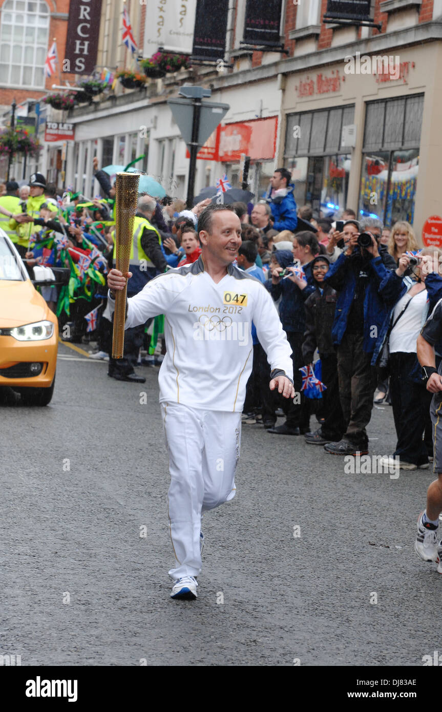 Olympic Torch bearer Northampton 2012 Stock Photo - Alamy
