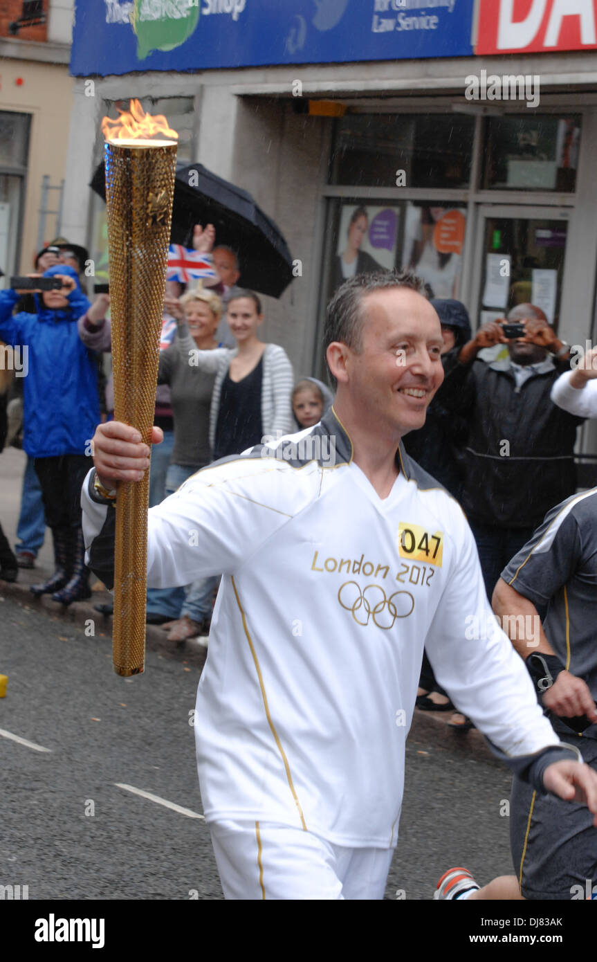 Olympic Torch bearer Northampton 2012 Stock Photo - Alamy