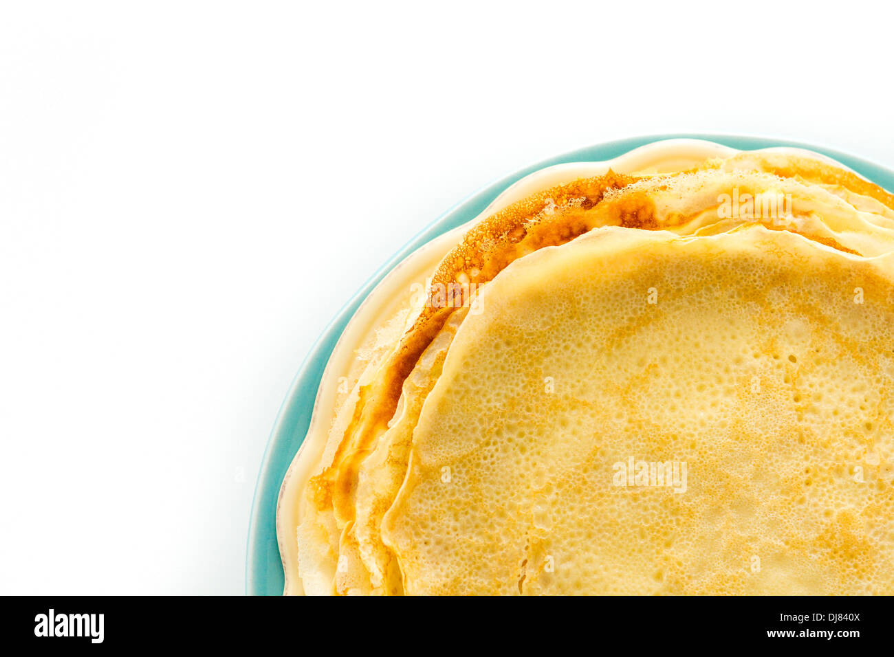Freshly homemade crepes on a white background Stock Photo - Alamy
