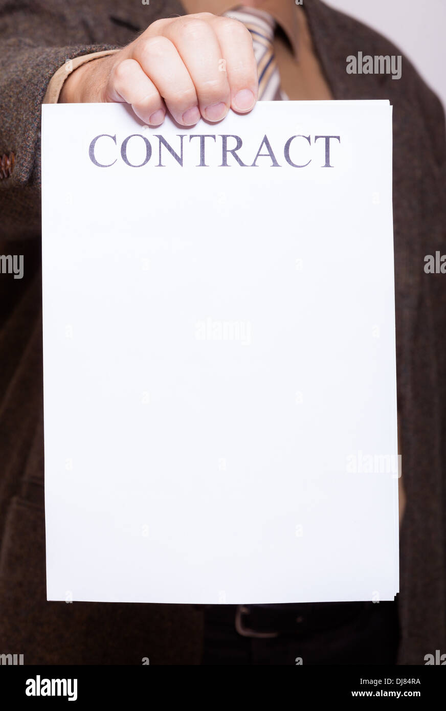 Business concept. Businessman holding blank empty paper sheet with sign ...