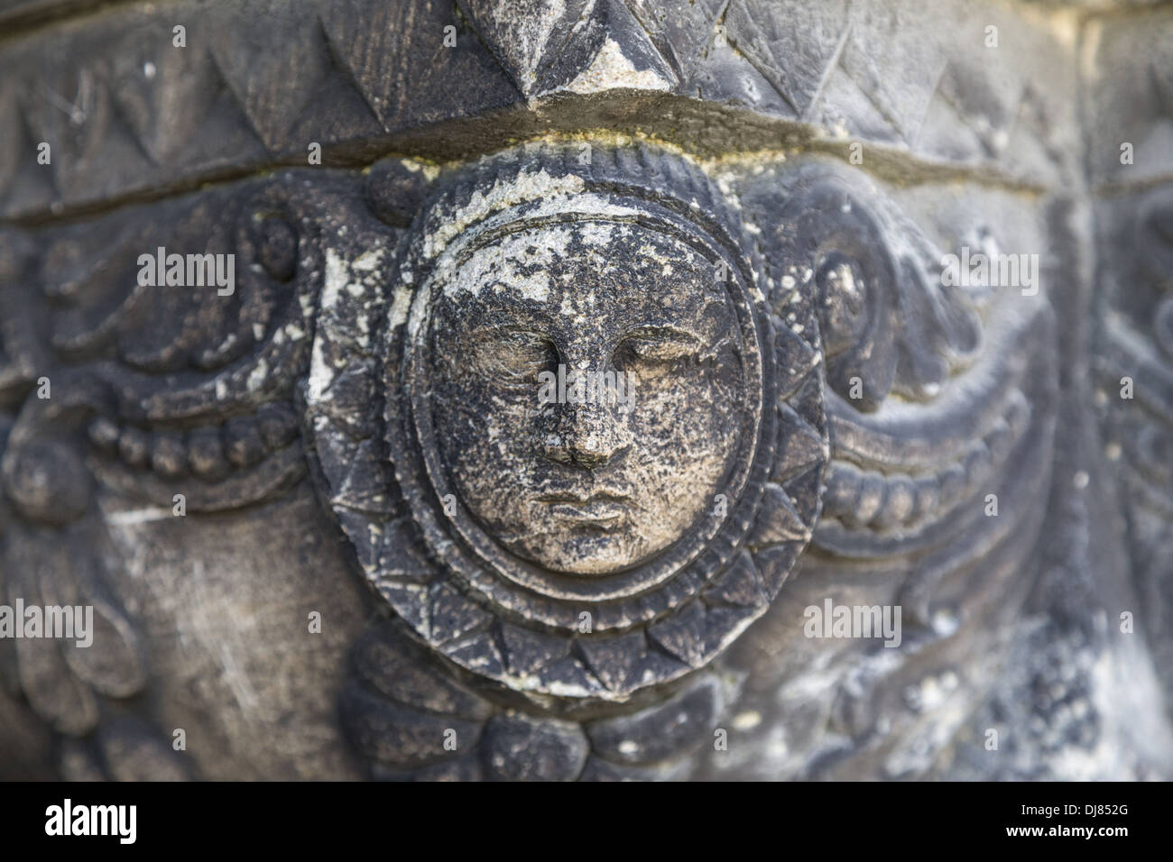 Stone face / gargoyle on St. Edwards Church tower in Corfe Castle ...